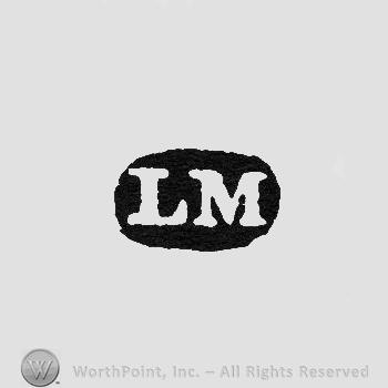 Mark with The letters "LM" and an oval. | #122540