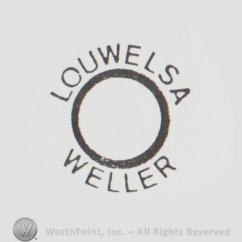 Mark with circle with the text "louwelsa weller" | #17321