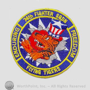 Mark with The text "74TH SQDN FLYING TIGERS | #347947