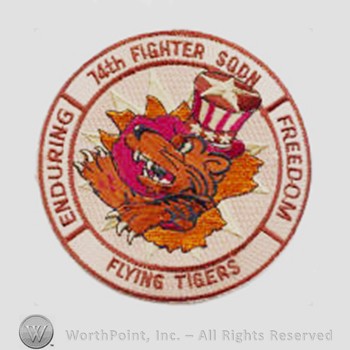 Mark with The text "74TH SQDN FLYING TIGERS | #347948