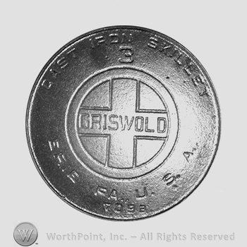 Mark with Word "GRISWOLD" written inside a cross | #504272