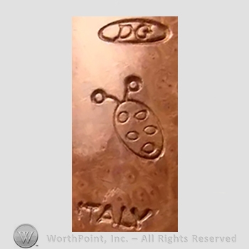 Mark with The letters "DG" written inside an | #505637