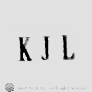 Mark with The letters "KJL" written in capital | #580513