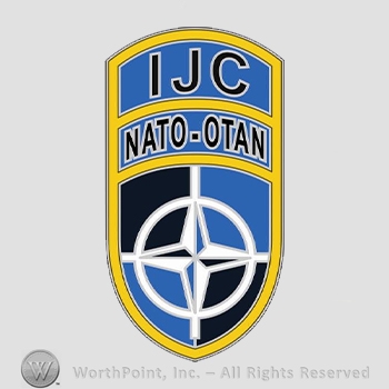 Mark with The acronyms "IJC", "NATO-OTAN" and a | #636958