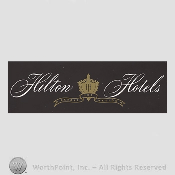 Mark with A rectangle, the text "Hilton Hotels", | #702009