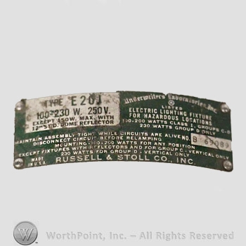 Mark with A metalic tag with the text "RUSSEL & | #720040