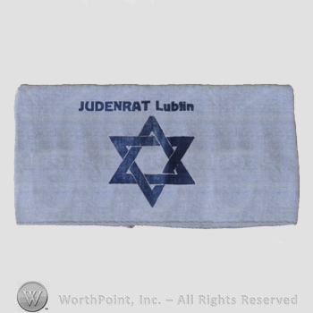 Mark with An armband with the text "JUDENRAT | #729401