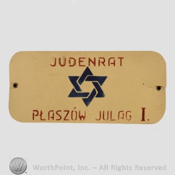 Mark with An armband with the text "JUDENRAT | #729402