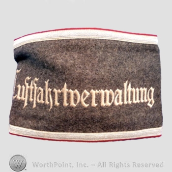 Mark with An armband with four stripes and the | #729491