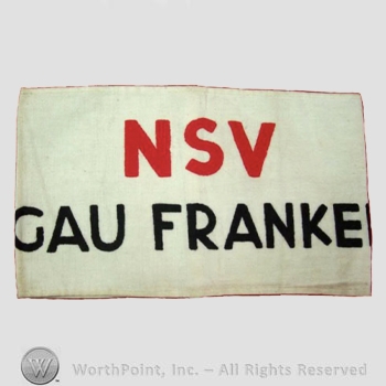 Mark with An armband with the text "NSV GAU | #729653