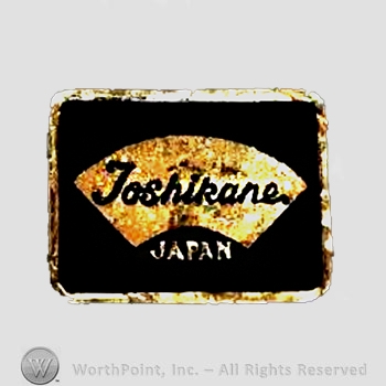 Mark with The text "Toshikane JAPAN" and a | #730768