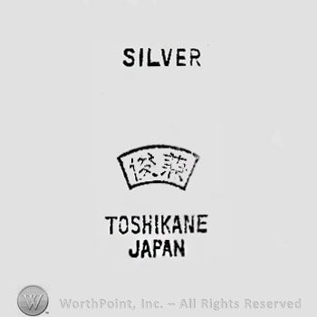 Mark with The text "SILVER TOSHIKANE JAPAN" and | #730772