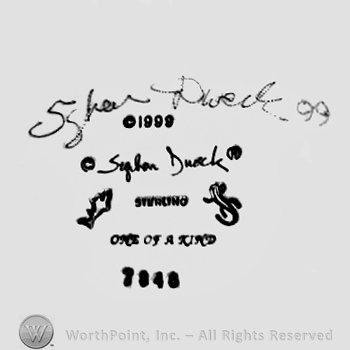 Mark with The text "Stephen Dweck 99 1999 Stephen | #730929