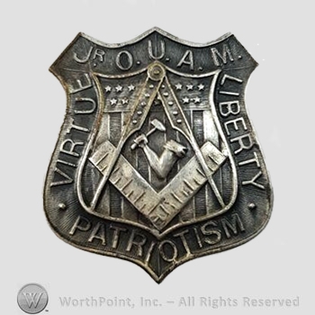 Mark with A shield, the letters "O.U.A.M.", the | #744701