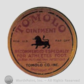 Mark with A lion and the text "TOMOLO OINTMENT, | #865389