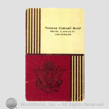 Mark with The text "THOMAS CABINET SHOP LOS | #880736