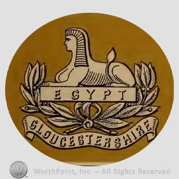 Mark with A badge, an Egyptian statuette, leaves, | #928608
