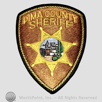 Mark with The text "PIMA COUNTY SHERIFF", a | #934675