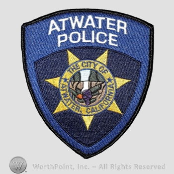 Mark with The text "ATWATER POLICE THE CITY OF | #934690