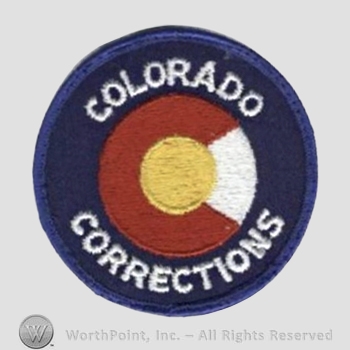 Mark with The text "COLORADO CORRECTIONS" and a | #934829