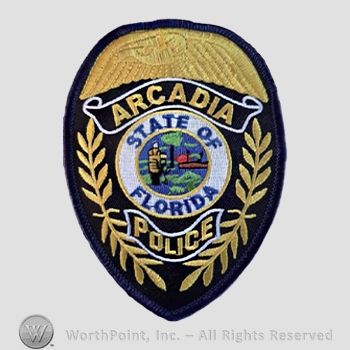 Mark with The text "ARCADIA POLICE, STATE OF | #934902