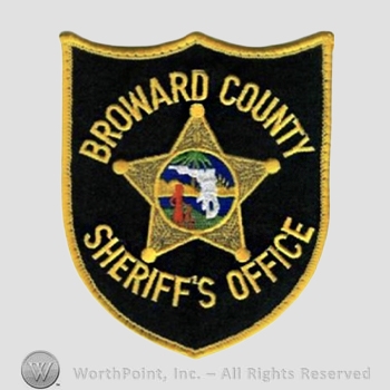 Mark with The text "BROWARD COUNTY SHERIFF'S | #934940