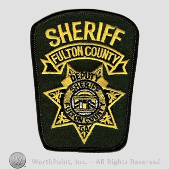 Mark with The text "SHERIFF, FULTON COUNTY, | #934983