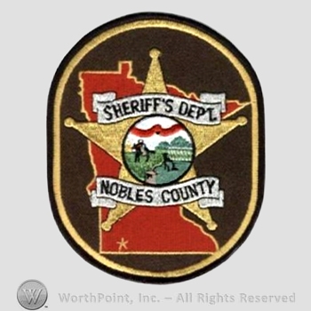 Mark with The text "SHERIFF'S DEPT. NOBLES | #935126
