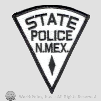 Mark with The text "STATE POLICE N.MEX.", a | #935194