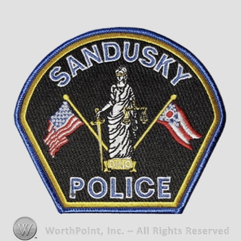 Mark with The text "SANDUSKY POLICE", a woman, a | #935325