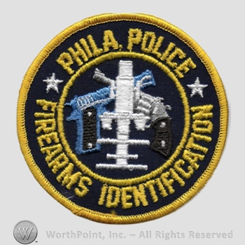 Mark with The text "PHILA. POLICE FIREARMS | #935392