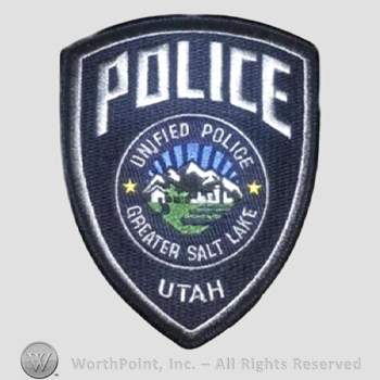 Mark with The text "POLICE UNIFIED POLICE GREATER | #935479