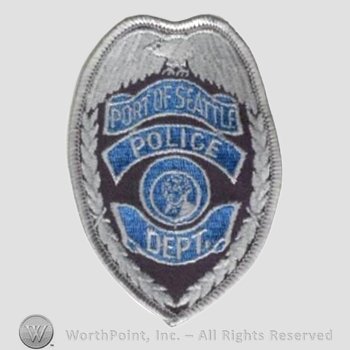 Mark with The text "PORT OF SEATTLE POLICE | #935534