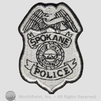 Mark with the text "SPOKANE POLICE", an eagle, a | #935544