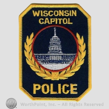 Mark with The text "WISCONSIN CAPITOL POLICE", a | #935566