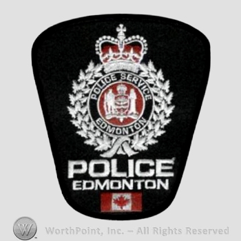 Mark with The text "POLICE SERVICE EDMONTON | #941501