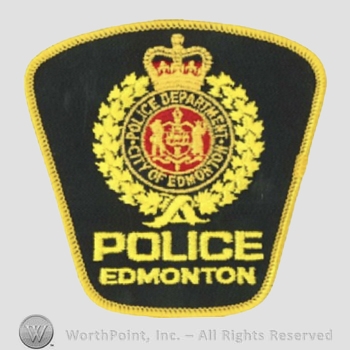 Mark with The text "POLICE EDMONTON POLICE | #941503