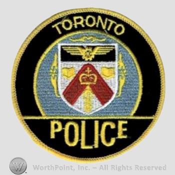 Mark with The text "TORONTO POLICE", a shield and | #941638