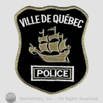 Mark with The text "VILLE DE QUEBEC POLICE" and a | #941675
