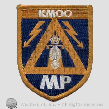 Mark with The text "KMOO MP", a triangle, a | #943230