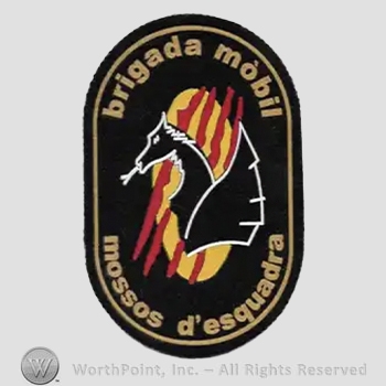 Mark with The text "brigada mobil mossos | #943506