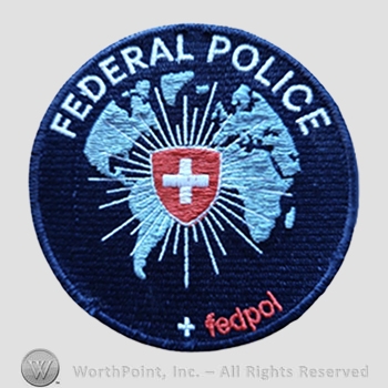 Mark with The text "FEDERAL POLICE fedpol", a | #943612