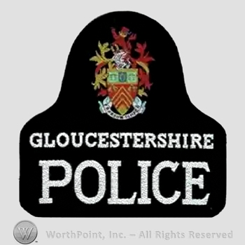 Mark with The text "GLOUCESTERSHIRE POLICE" and a | #943677