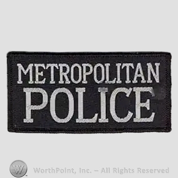 Mark with The text "METROPOLITAN POLICE" and a | #943689