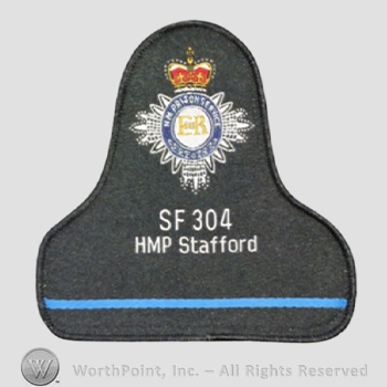 Mark with The text "H.M. PRISON SERVICE SF 3-4 | #943715