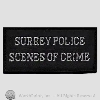 Mark with The text "SURREY POLICE SCENES OF | #943728