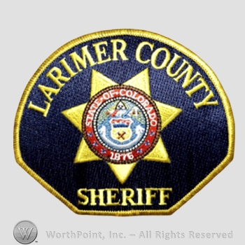 Mark with The text "LARIMER COUNTY SHERIFF", a | #943760