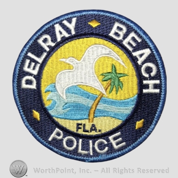 Mark with The text "DELRAY BEACH POLICE FLA.", a | #943763