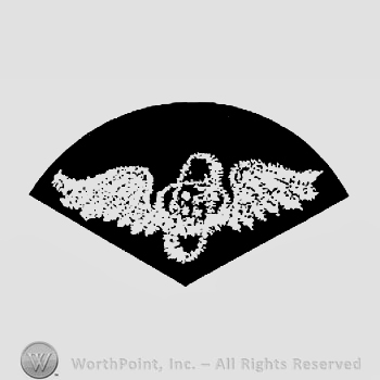 Mark with Two crossed ovals and two wings. | #958380