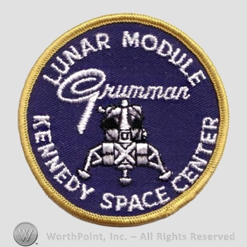 Mark with The text "LUNAR MODULE Grumman KENNEDY | #977146